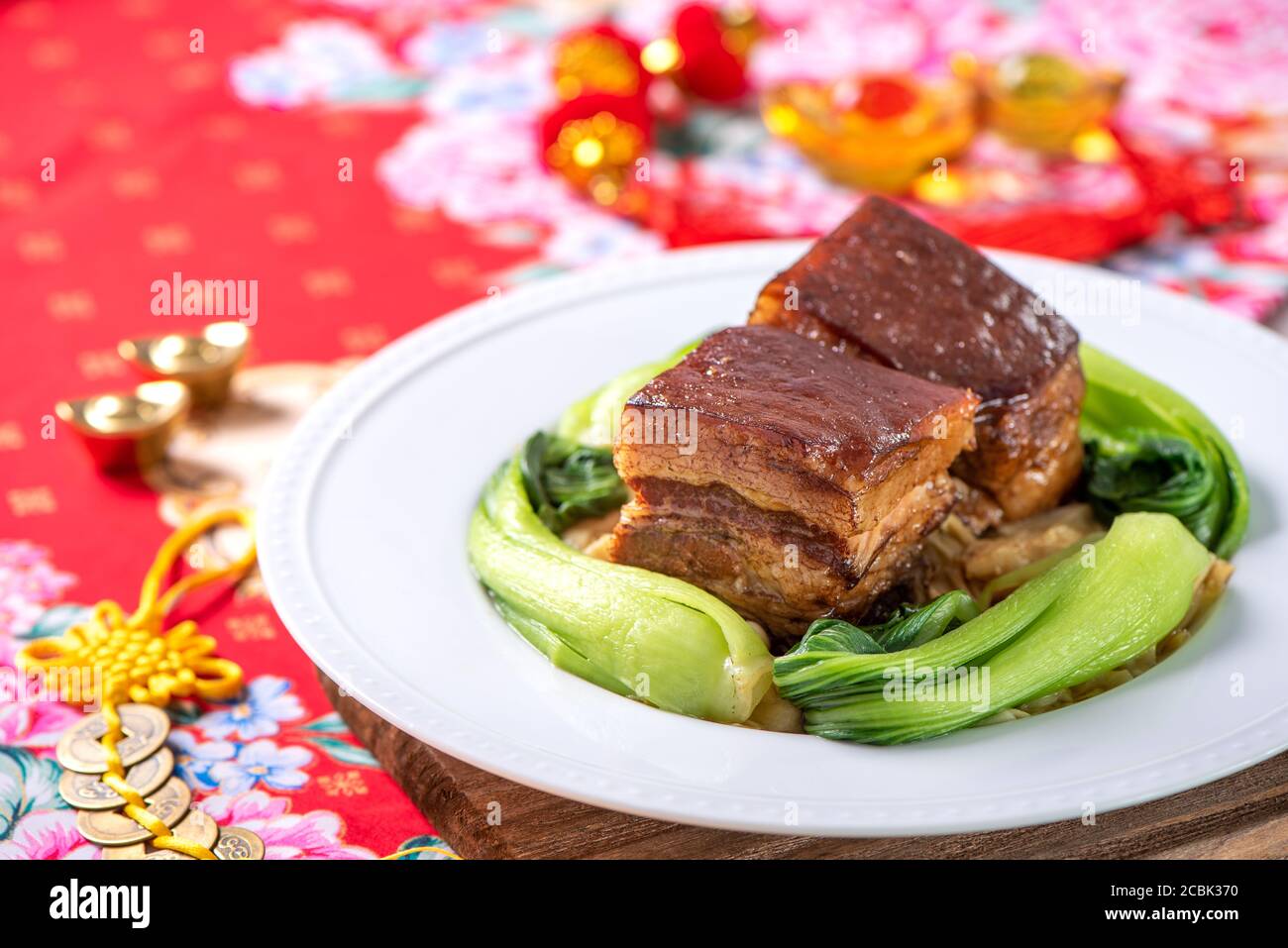 Dong Po Rou (Dongpo pork meat) in a beautiful blue plate with green ...