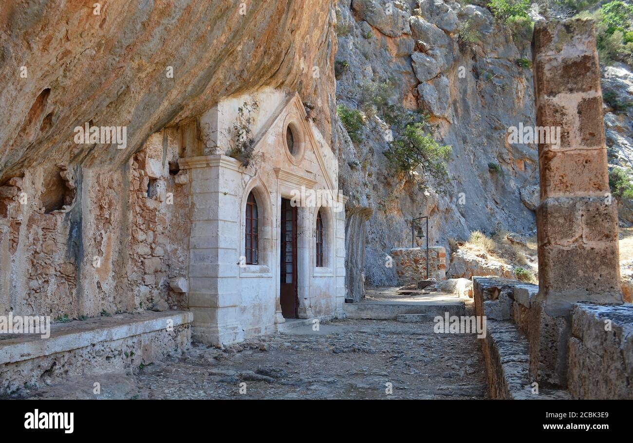 The 16th century monastery built into the cliff at Katholiko, Akrotiri ...