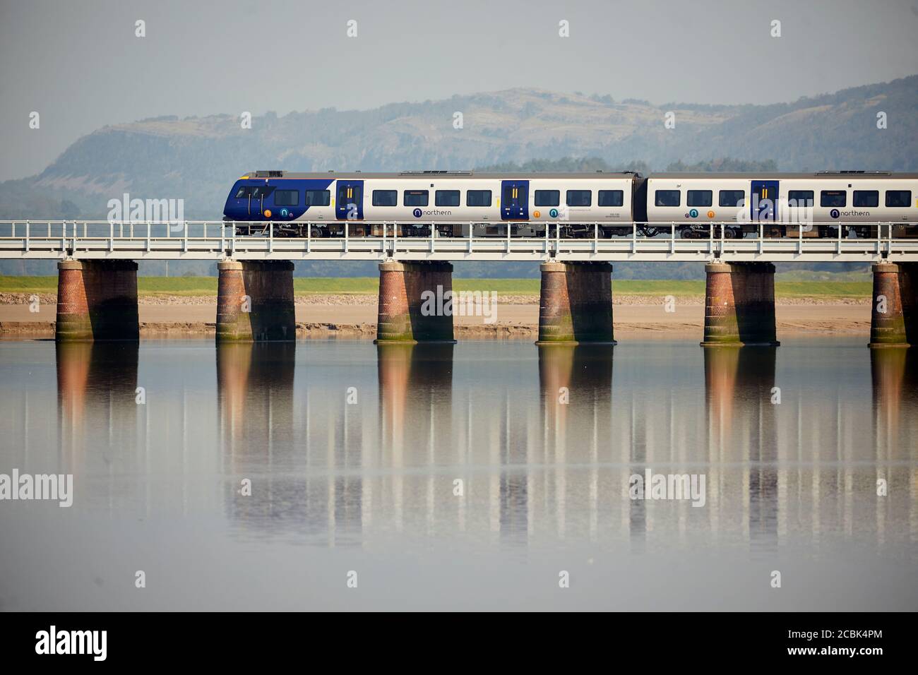 Arnside village Cumbria coastal beach Morecambe Bay, River Kent crossed ...