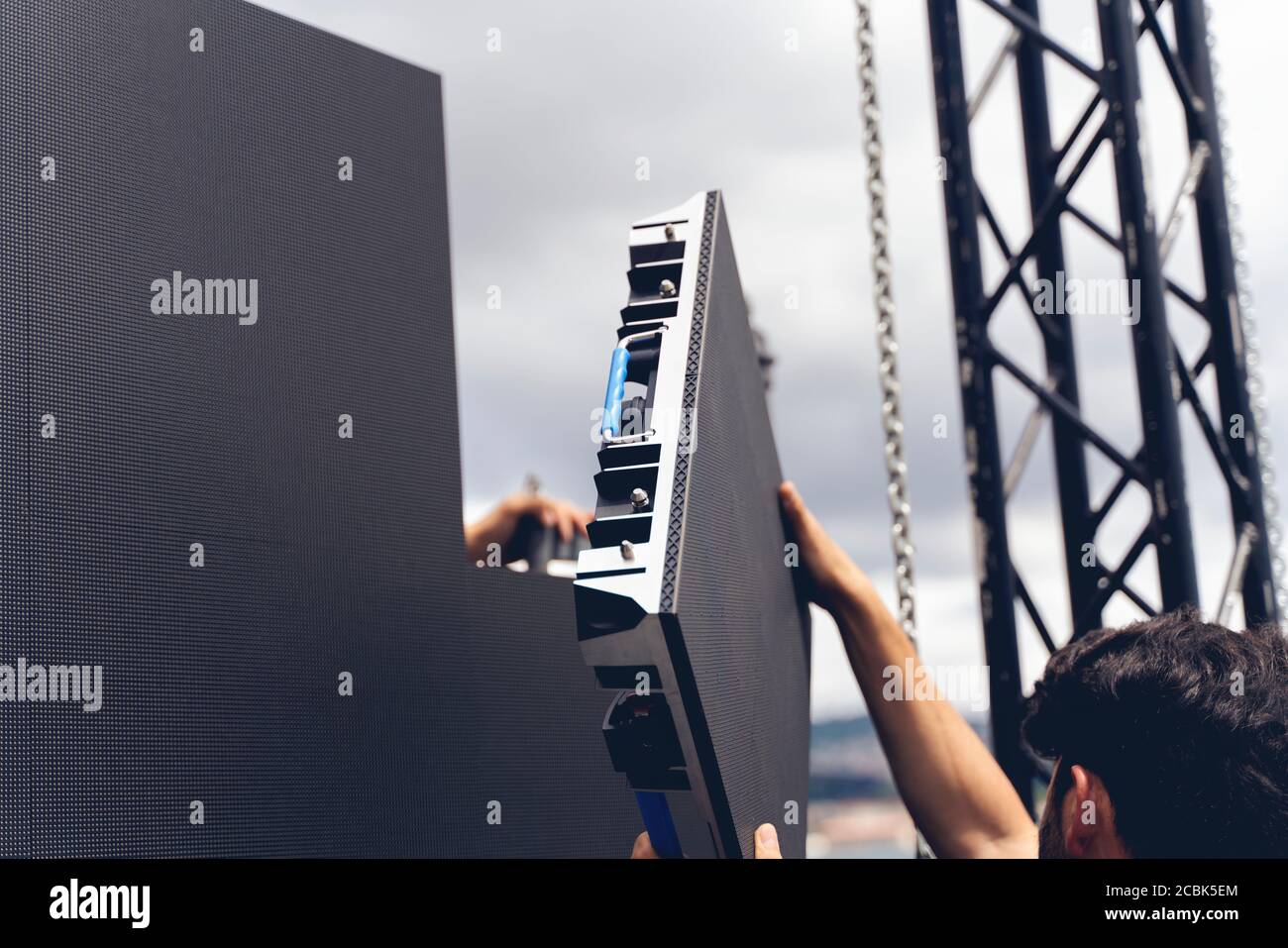 Setup phase a LED LCD wall or stage panel. Display system for concerts ...