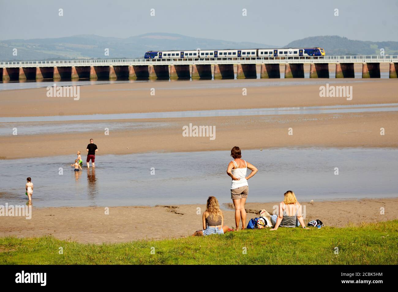 Arnside village Cumbria coastal beach Morecambe Bay, River Kent crossed ...