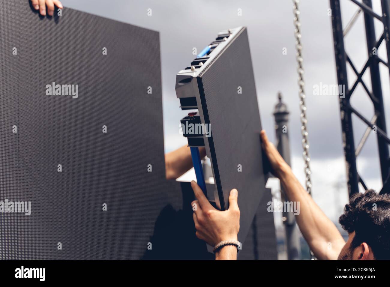 Setup phase a LED LCD wall or stage panel. Display system for concerts ...