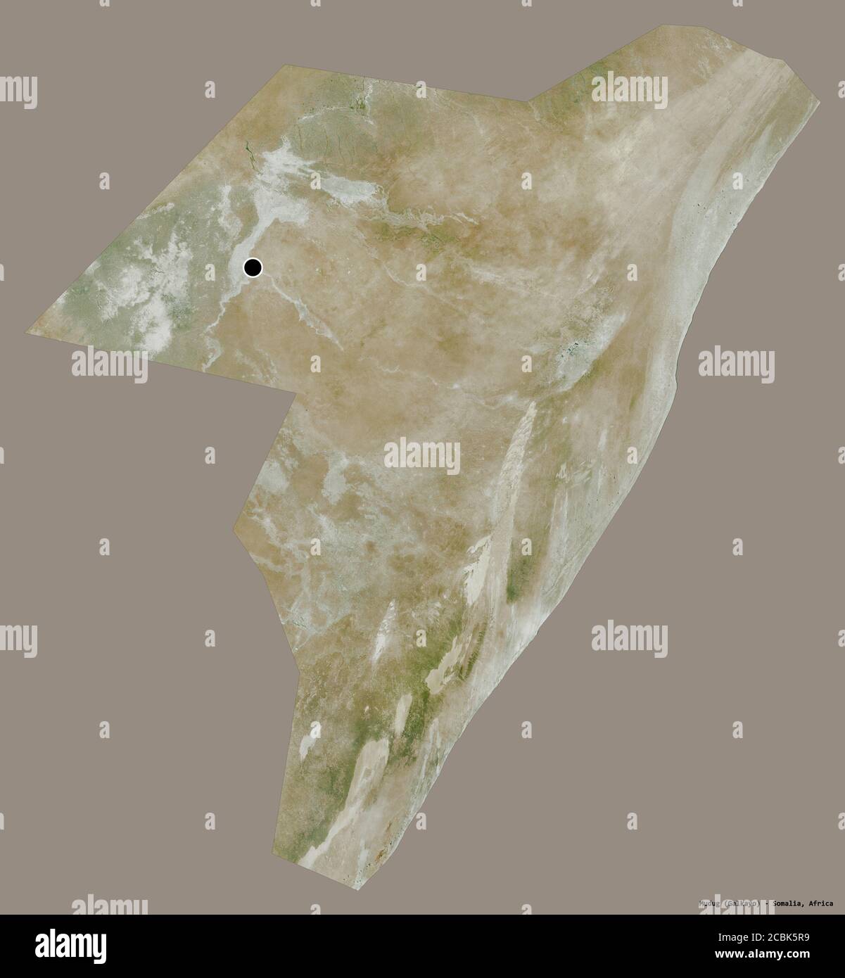 Shape of Mudug, region of Somalia, with its capital isolated on a solid ...