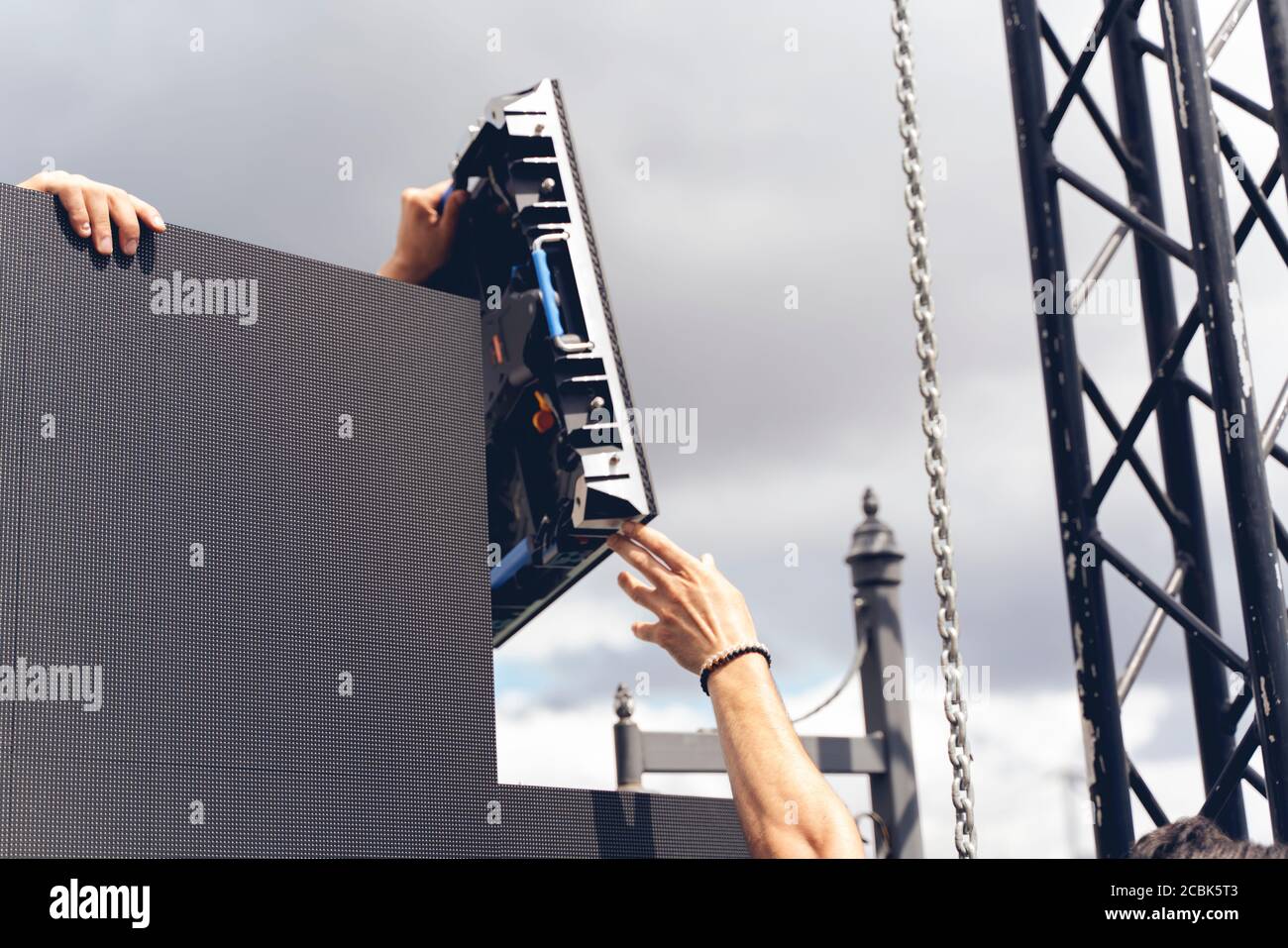 Setup phase a LED LCD wall or stage panel. Display system for concerts ...