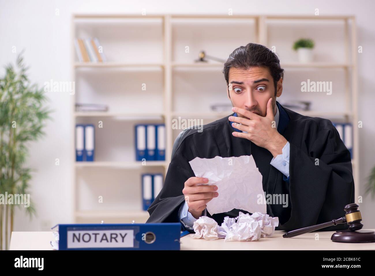 Young judge working in courthouse Stock Photo - Alamy