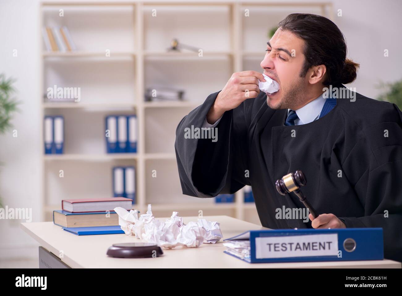 Young judge working in courthouse Stock Photo - Alamy