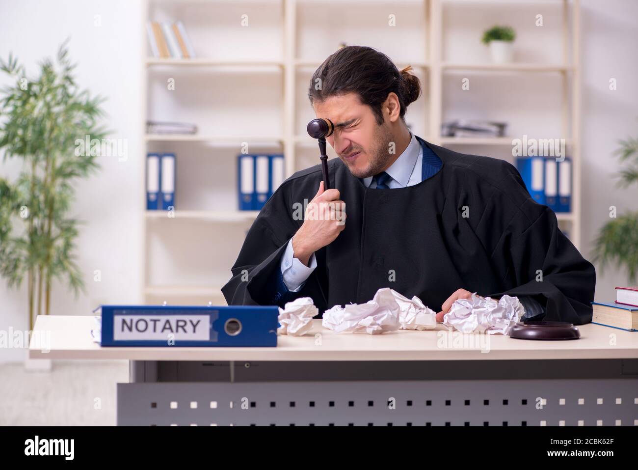 Young judge working in courthouse Stock Photo - Alamy