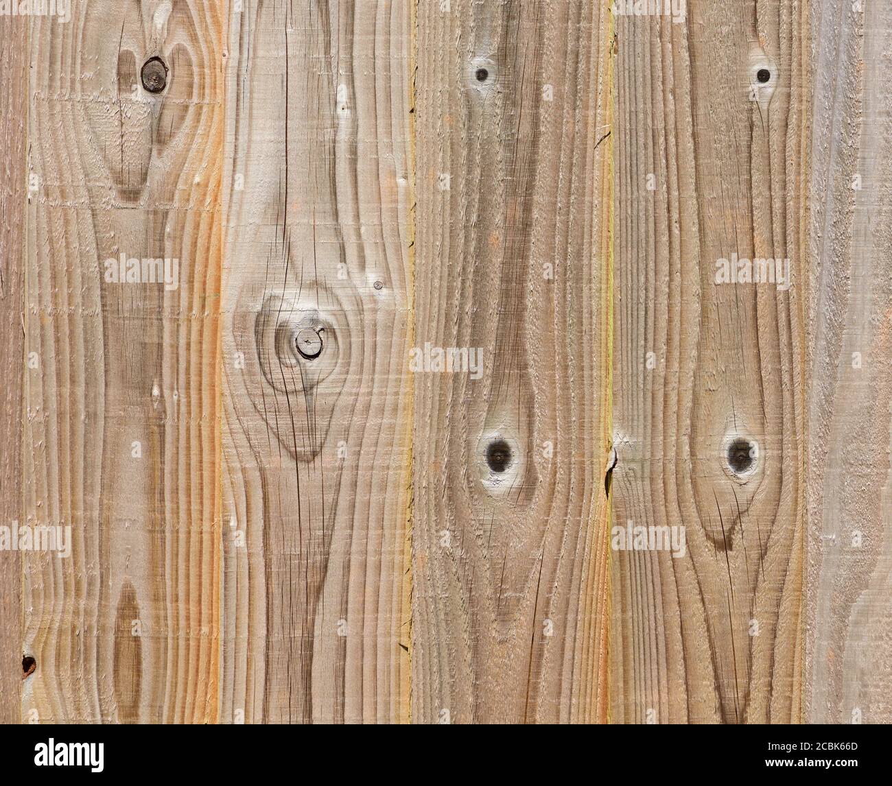 Knots in garden fencing Stock Photo - Alamy