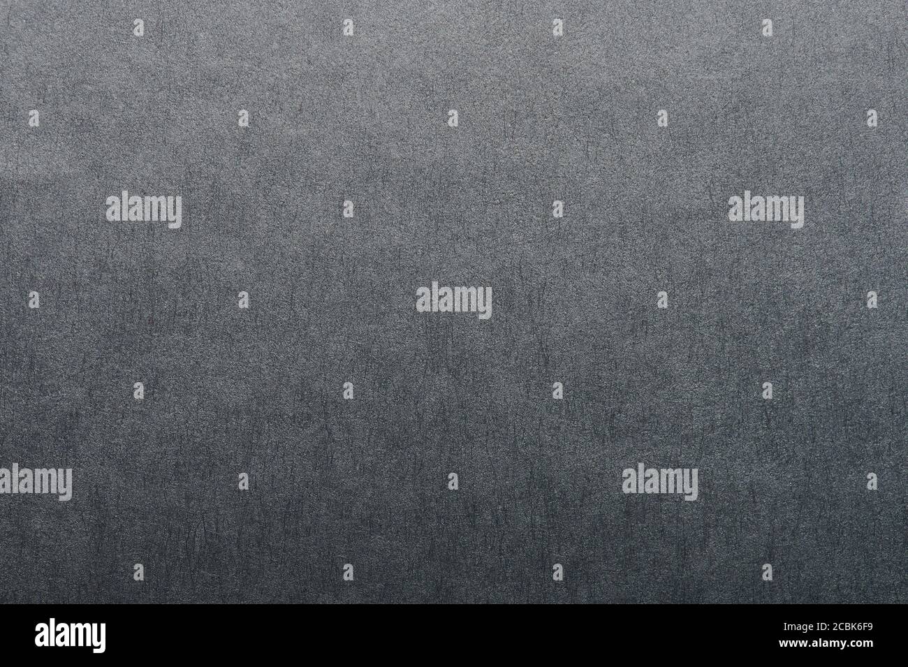Gray dark paper background with rough surface close up view Stock Photo ...