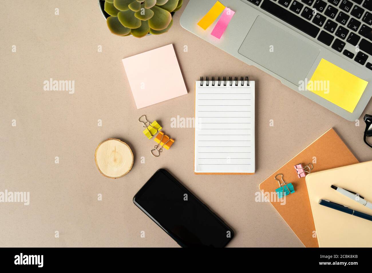 Open laptop with blank notebook, view from above. Workplace concept ...
