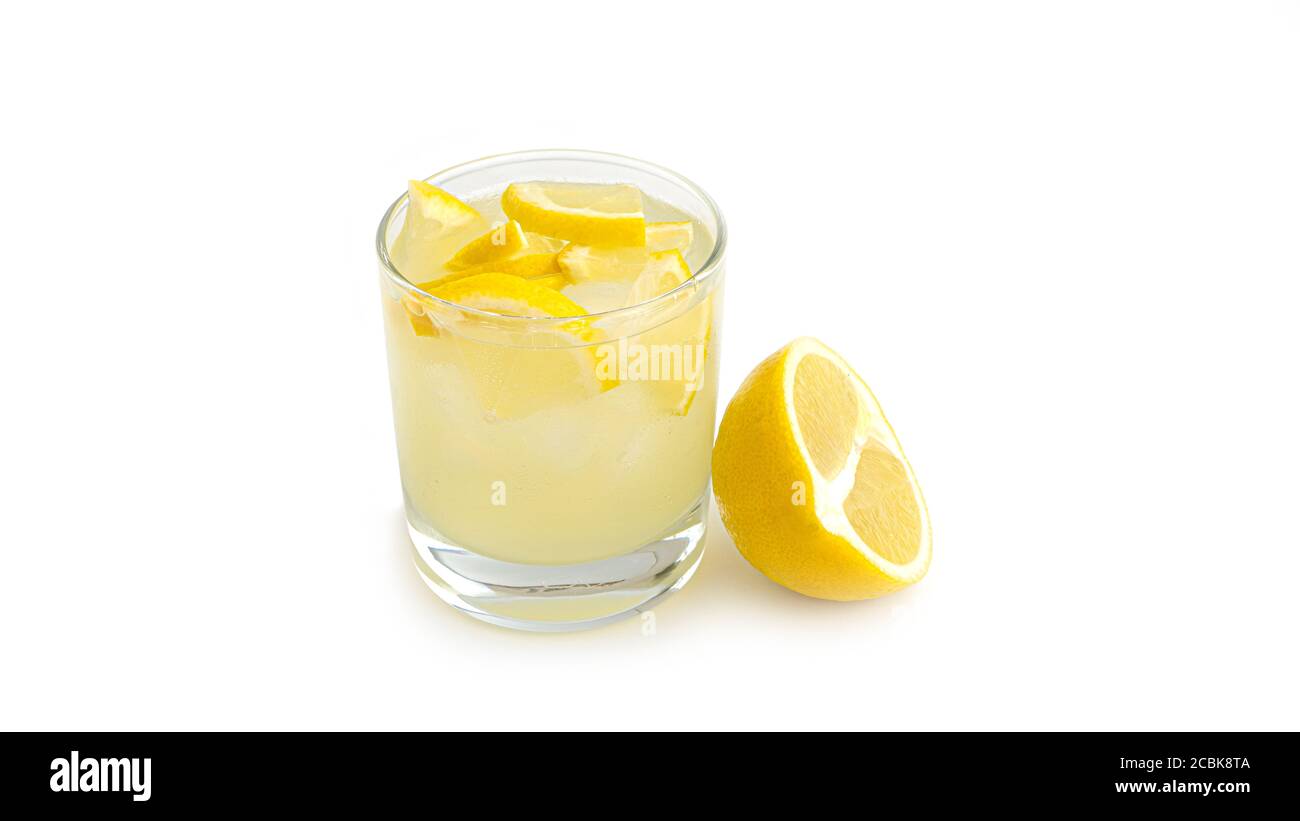 Glass with lemon lemonade and ice on a white background Stock Photo - Alamy