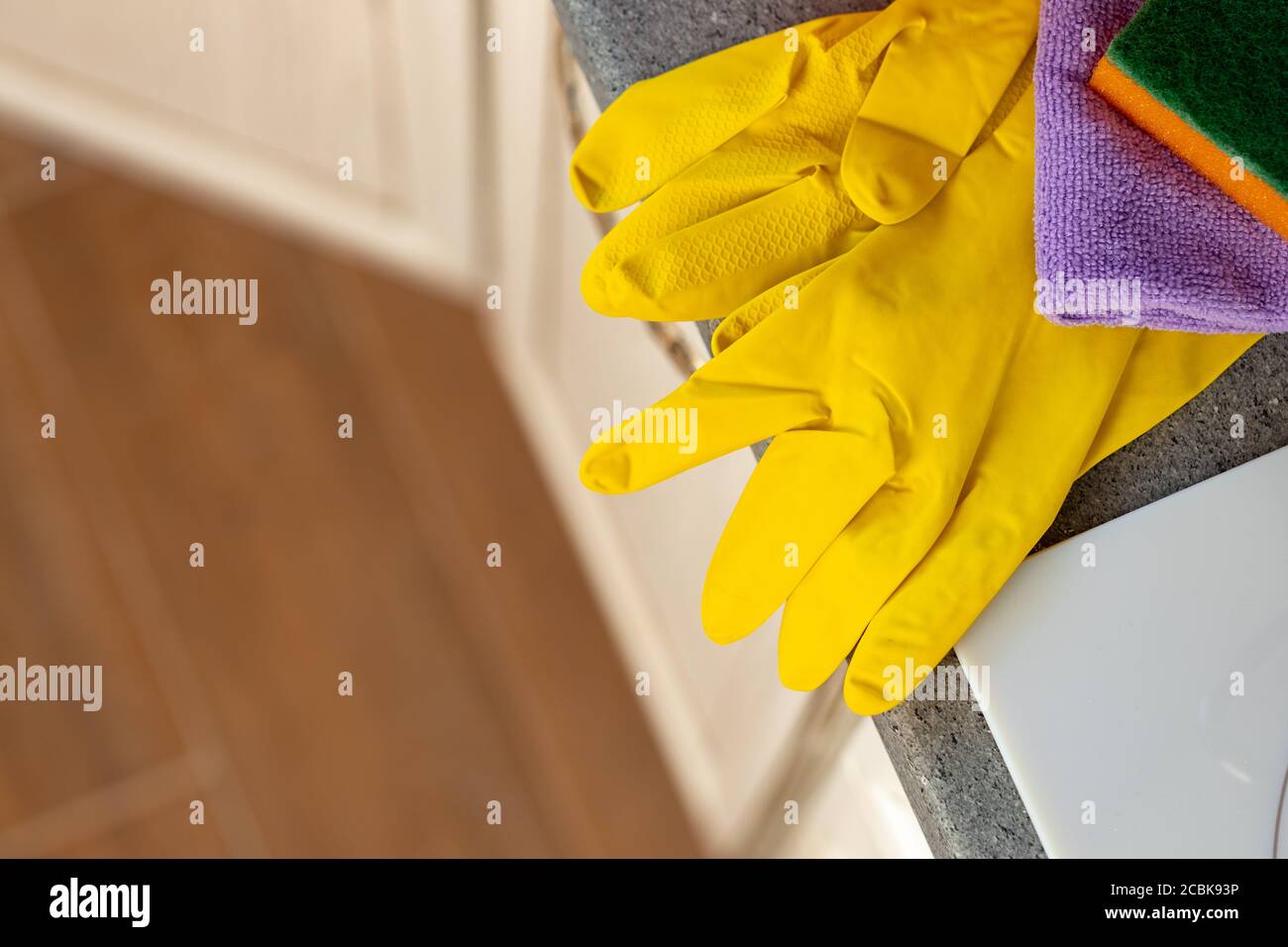 Cleaning sponge and rag on kitchen counter Stock Photo - Alamy