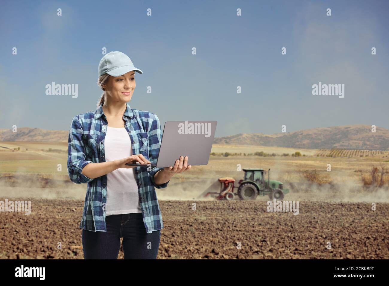Woman operating computer hi-res stock photography and images - Alamy