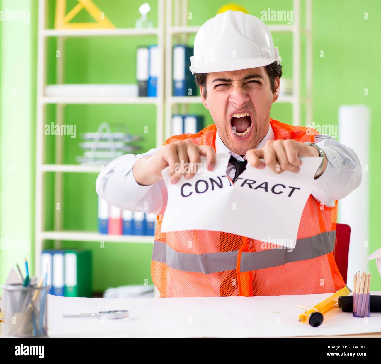 The angry construction supervisor cancelling contract Stock Photo - Alamy