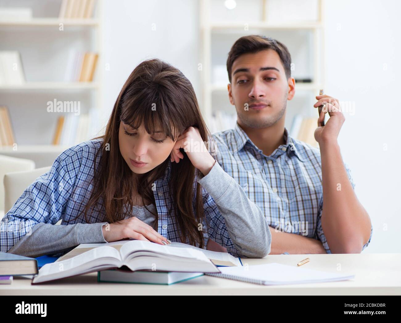 The students sitting and studying in classroom college Stock Photo - Alamy