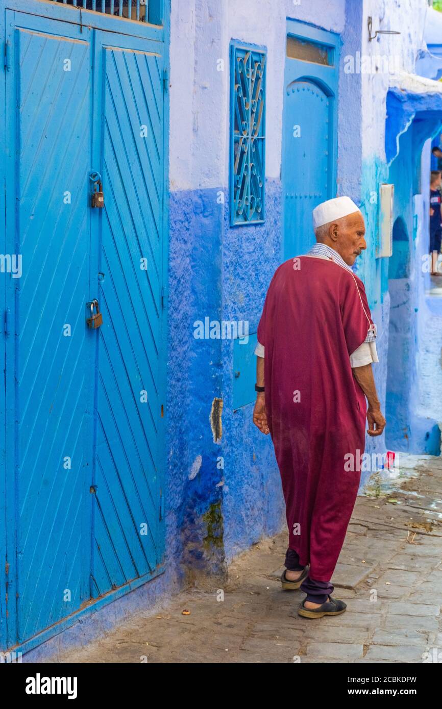 CHEFCHAOUEN, MOROCCO, 22 AUGUST 2018: Traditional moroccan man walking ...