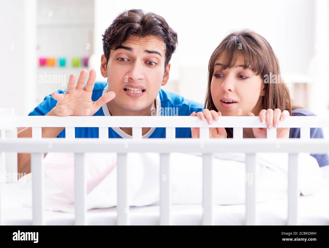 Crying baby stressed parents hi-res stock photography and images - Alamy