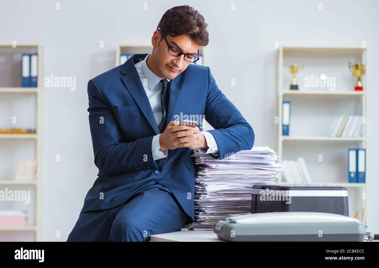 The businessman making copies in copying machine Stock Photo - Alamy