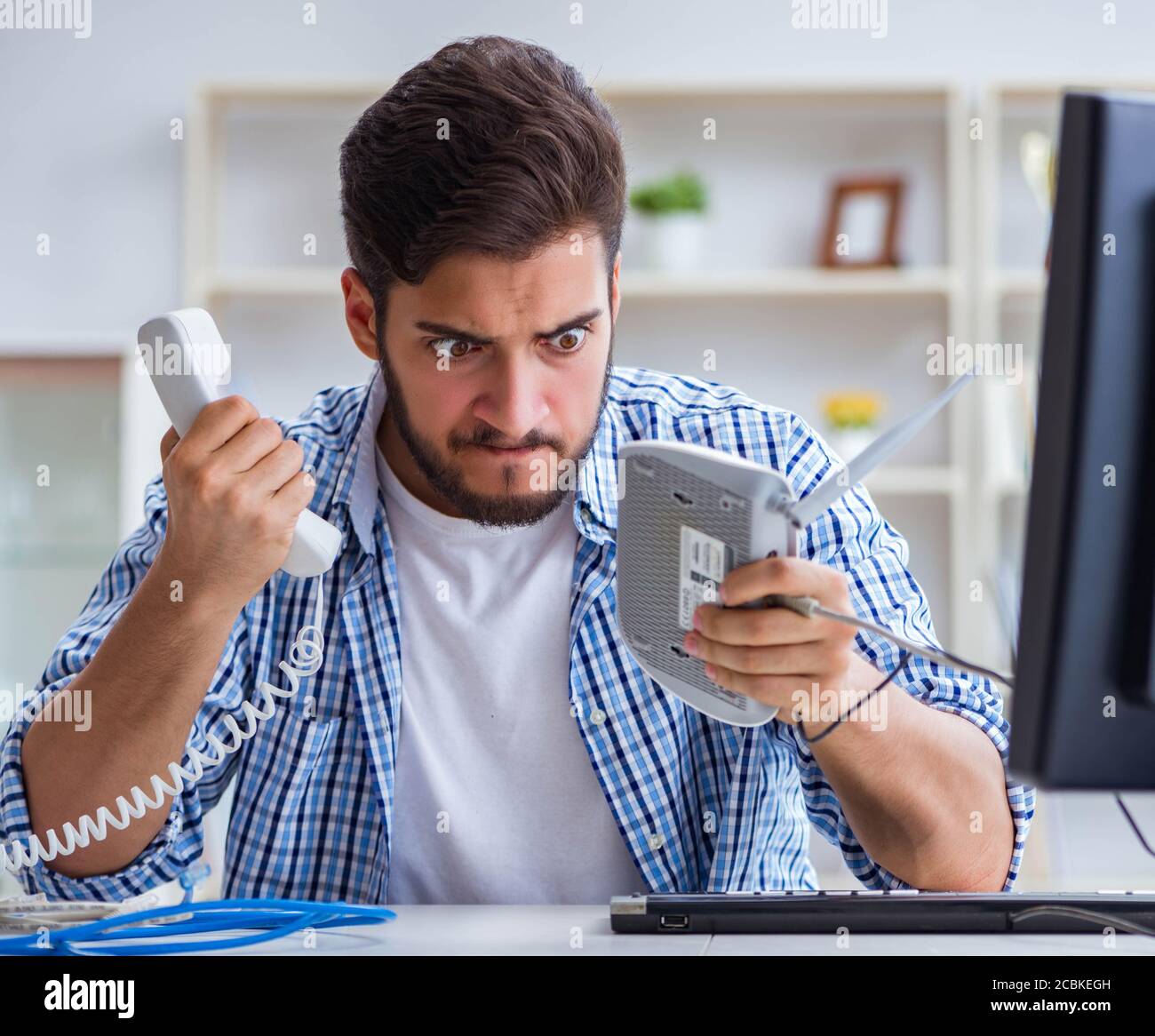 The frustrated young man due to weak internet reception Stock Photo - Alamy