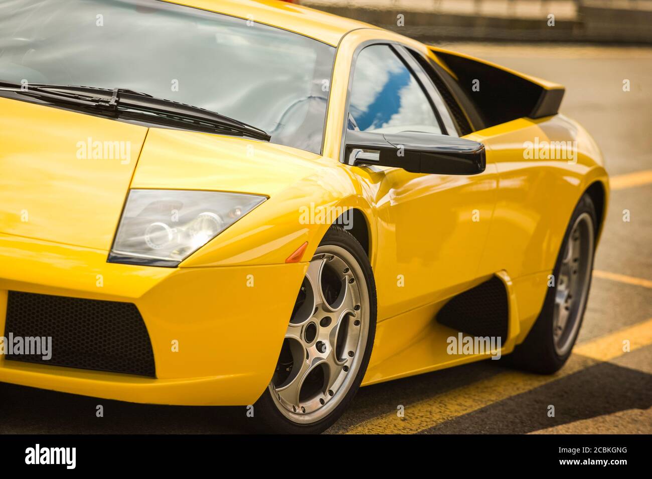 Front view of a yellow luxury sportcar Stock Photo - Alamy