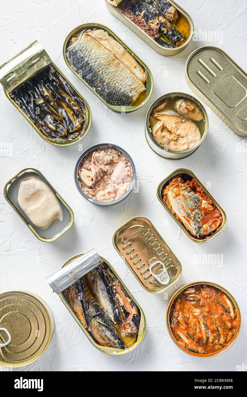 Tin can of fish and seafood, opened and closed cans with Saury ...