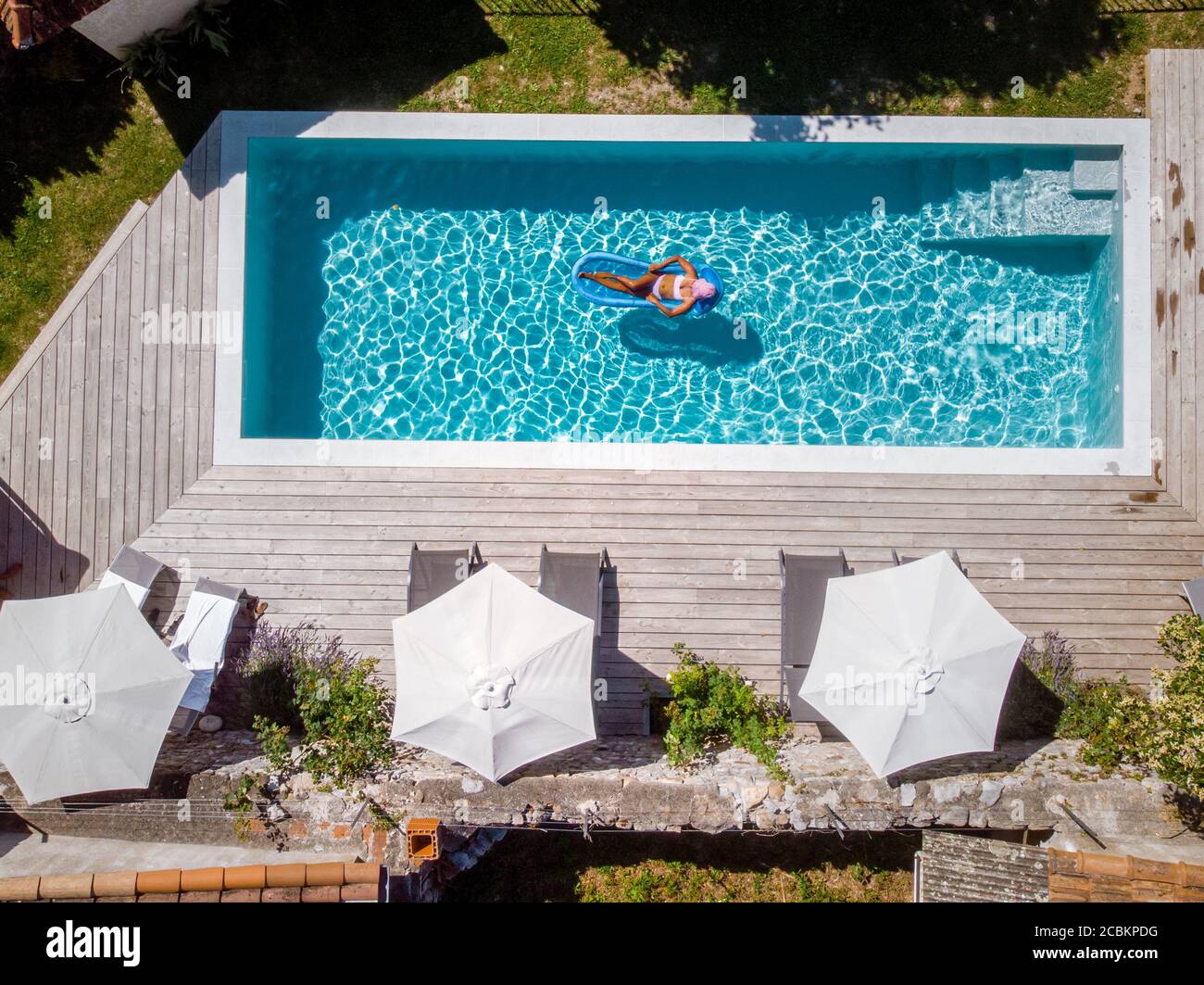 two person swim in the pool at the hotel. View from above, couple men ...