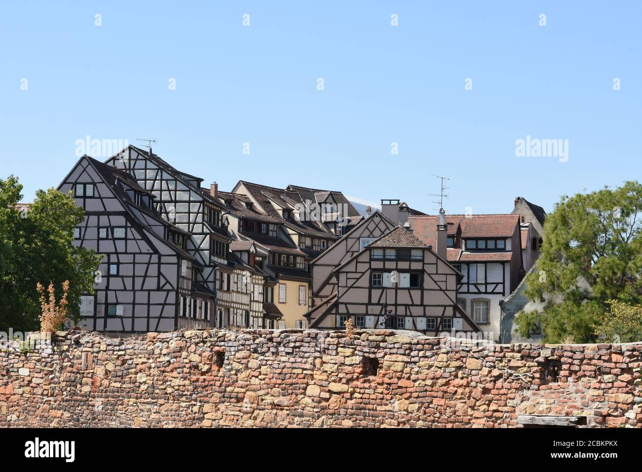 Half-timbered medieval and early Renaissance buildings behind red ...