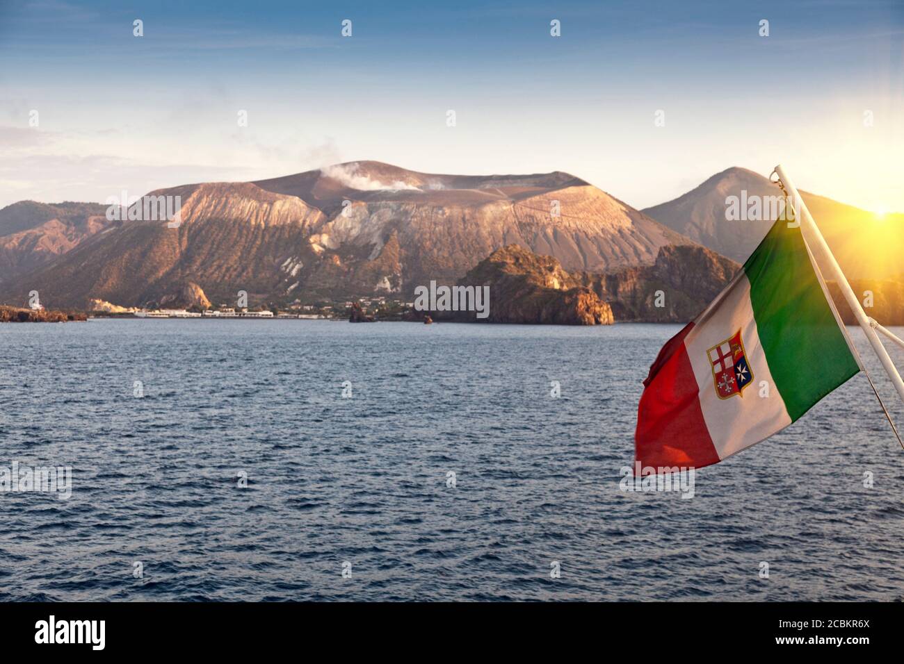 Spanish flag over ocean Stock Photo - Alamy