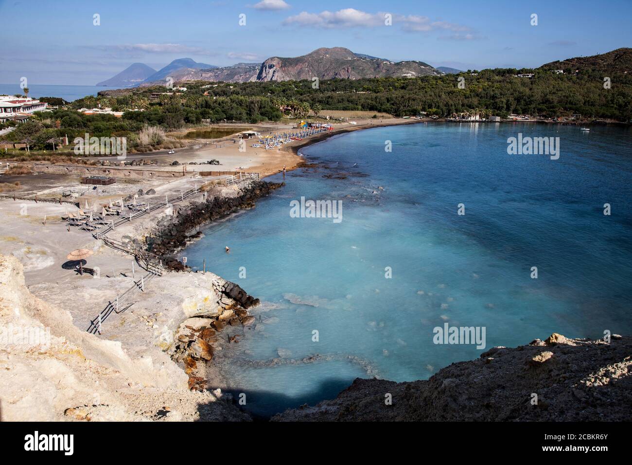 Rural lake and rocky beach Stock Photo - Alamy