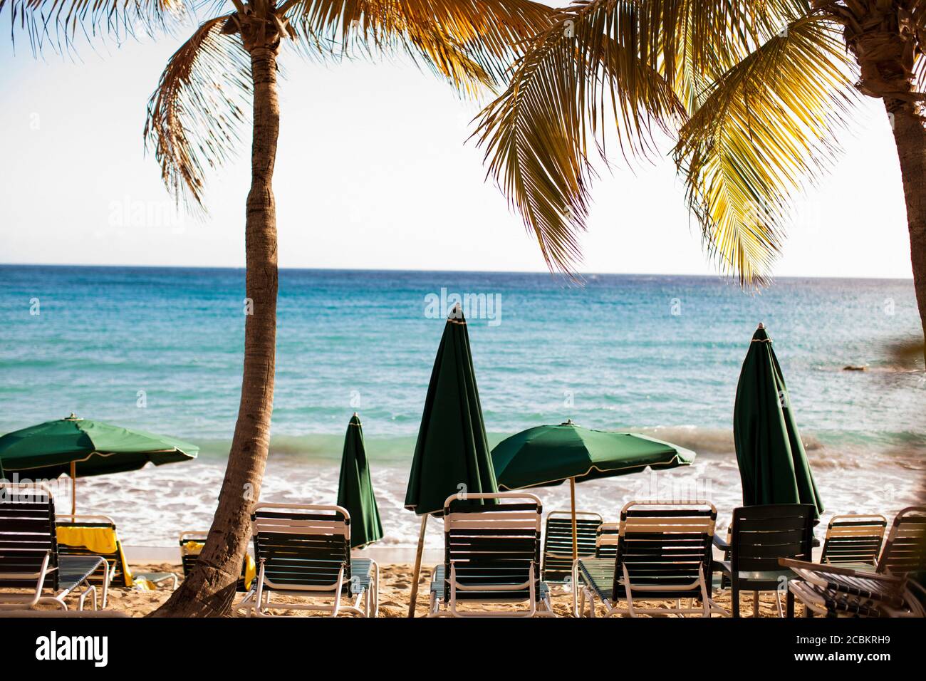 Empty sun loungers on the beach hi-res stock photography and images - Alamy