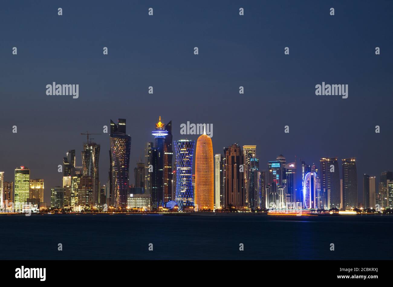 Skyscrapers of downtown Doha at night, Qatar Stock Photo - Alamy