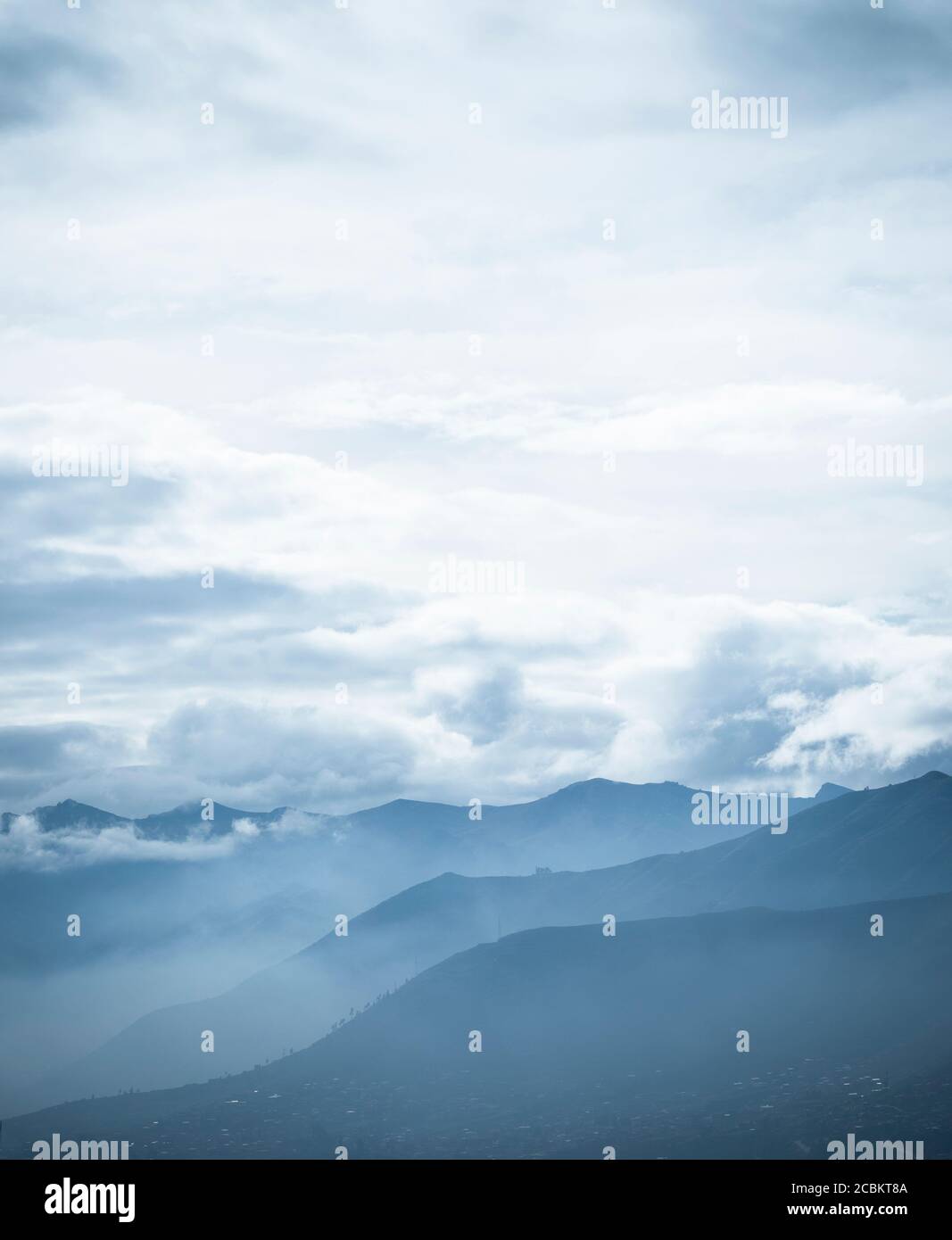 View of misty mountains from Cusco, Peru, South America Stock Photo - Alamy