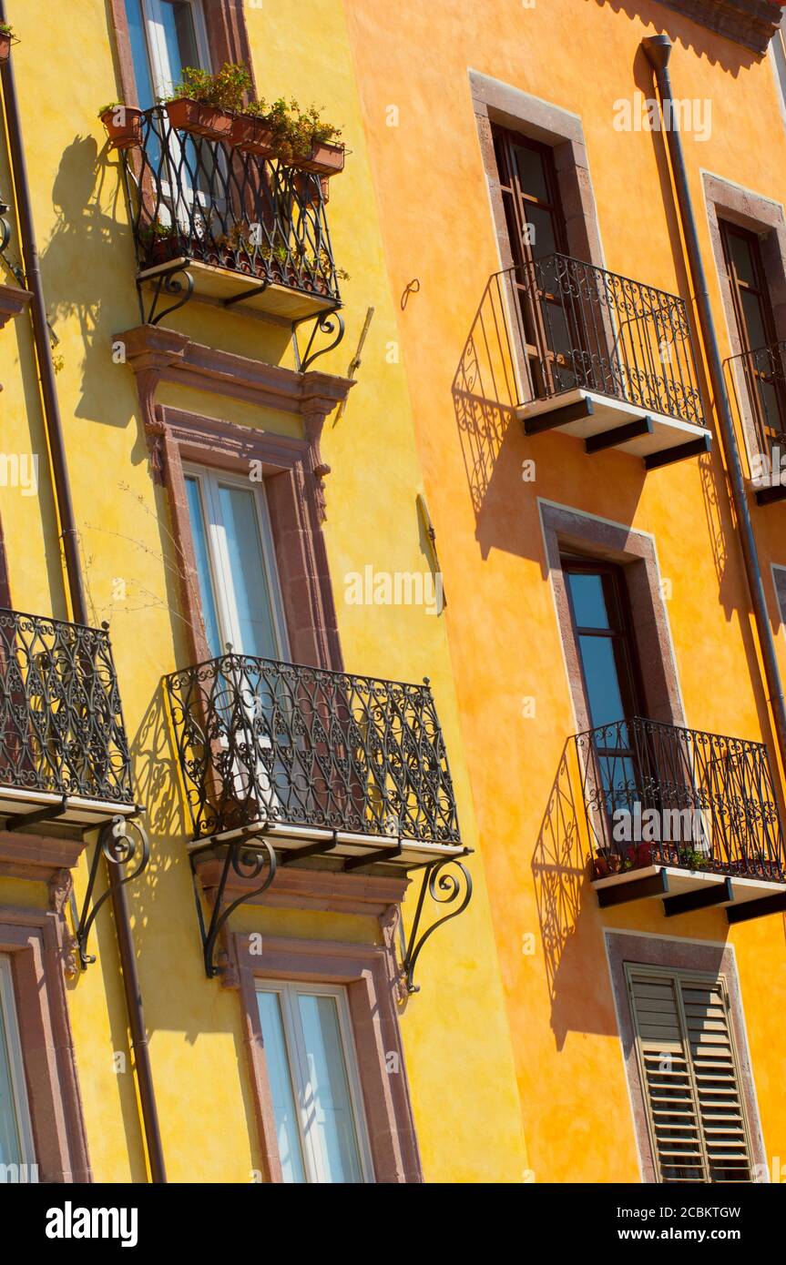 Detail of yellow house facade with balconies, Sardinia, Italy Stock ...