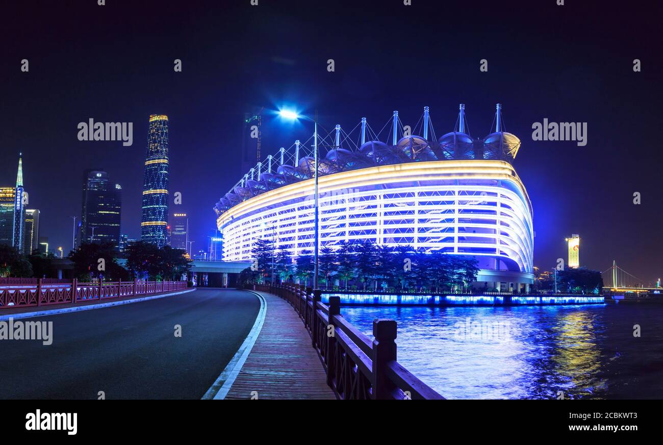 Riverfront olympic stadium illuminated at night, Guangzhou, China Stock ...