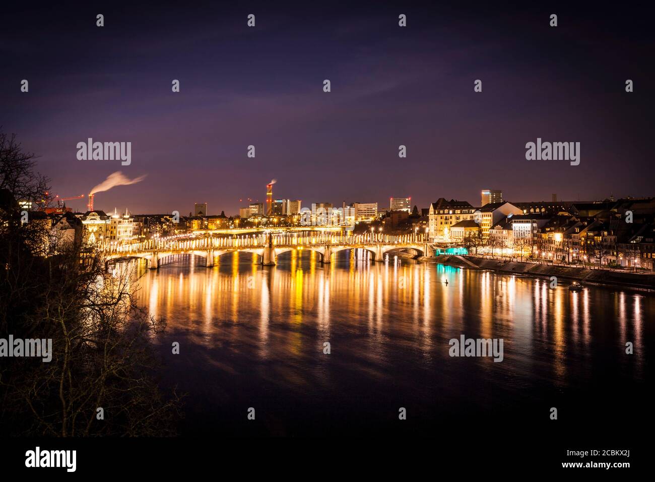 Bridge over river Rhine illuminated at night, Basel, Switzerland Stock ...