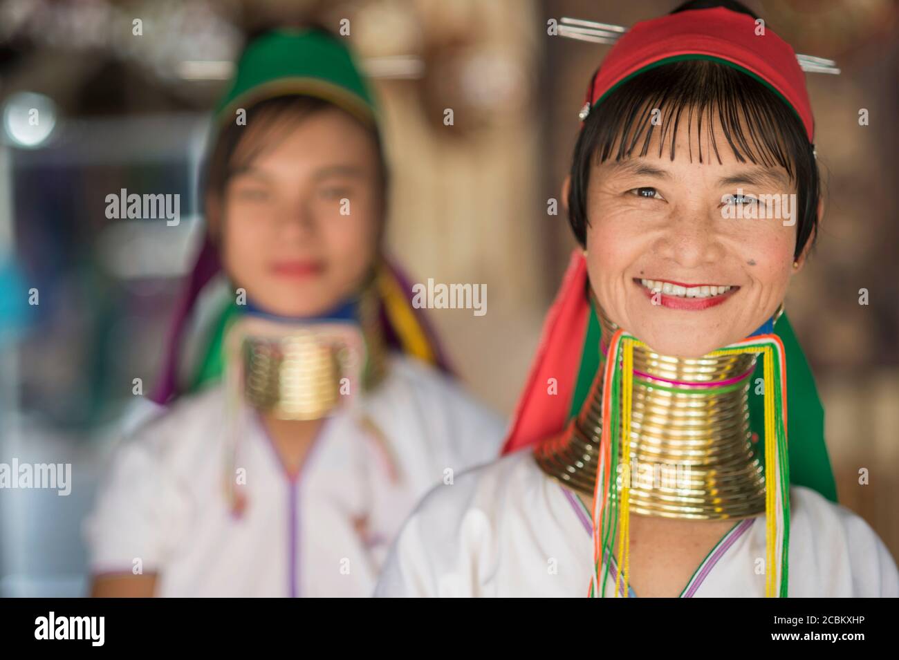 Portrait of two women in traditional clothing, Inle lake, Burma Stock ...