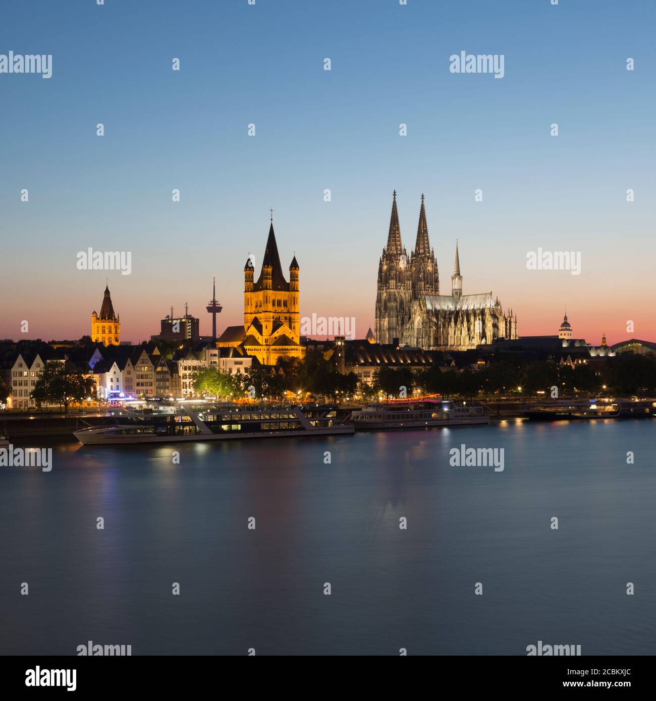 Waterfront cityscape with Town Hall, Great St Martin Church and Cologne ...