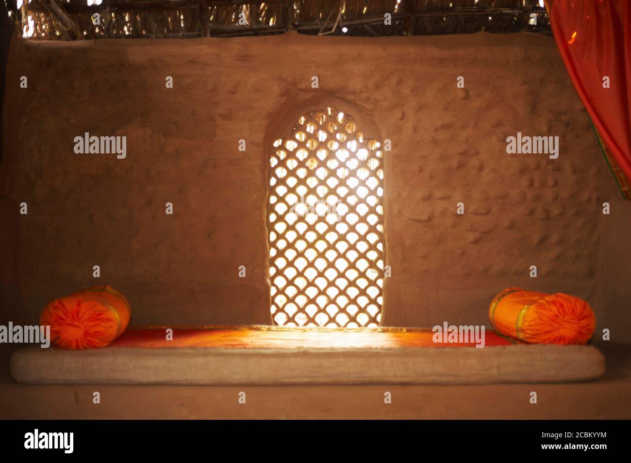 Pierced window and bench, Goa, India Stock Photo - Alamy