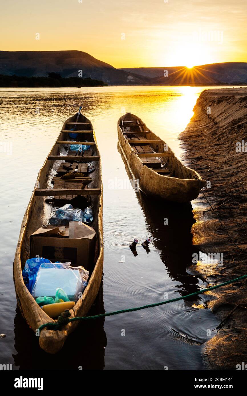 Boats on Tsiribihina River at sunset, Madagascar, Africa Stock Photo ...