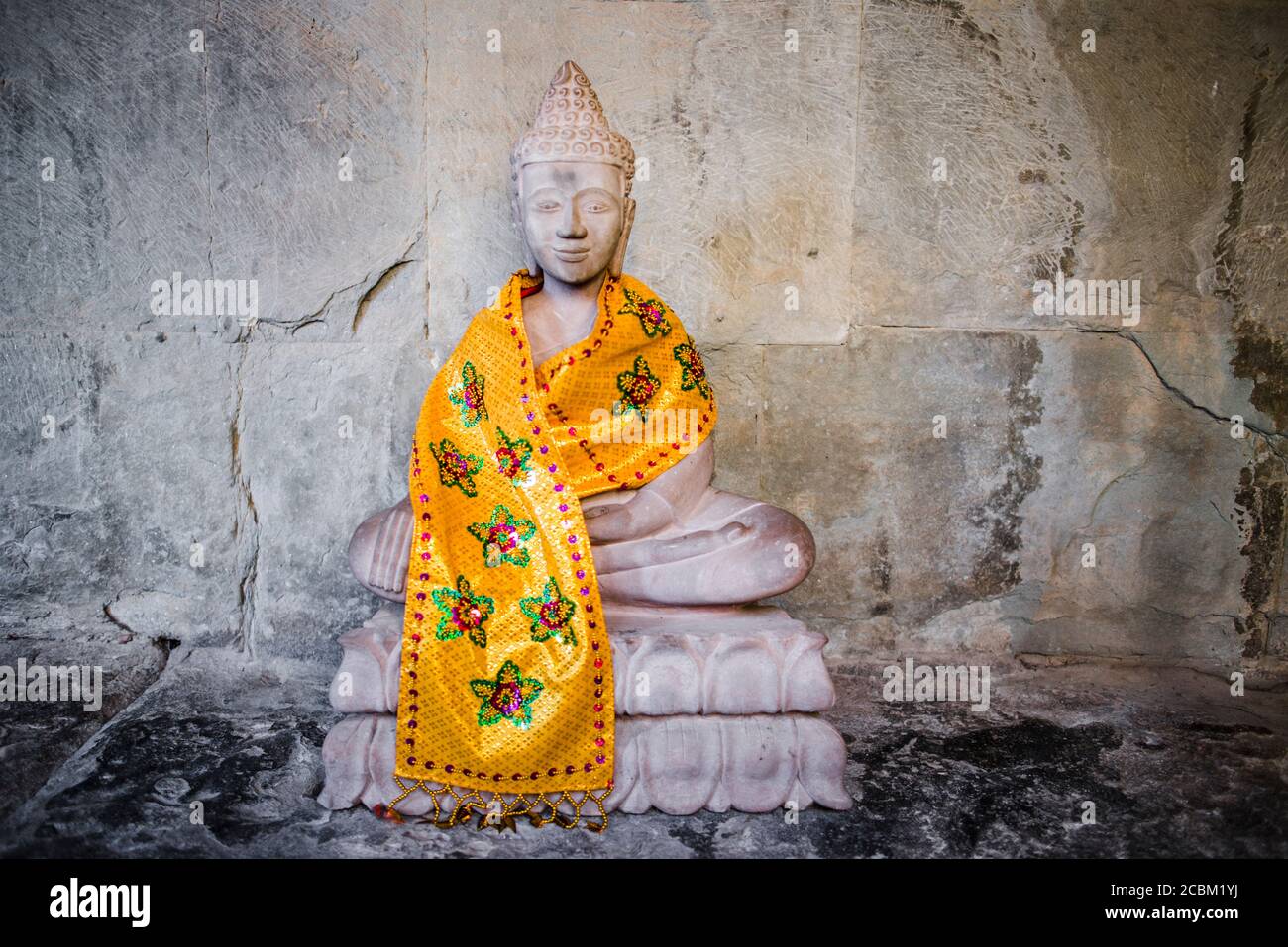 Buddhist statue with golden sash, Angkor Wat, Cambodia Stock Photo - Alamy