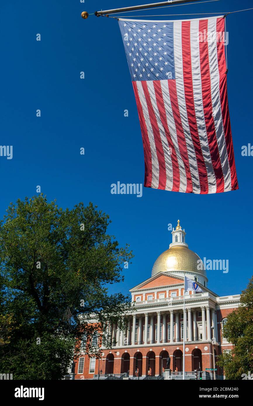 Massachusetts State House and American flag, Boston, Massachusetts. USA ...