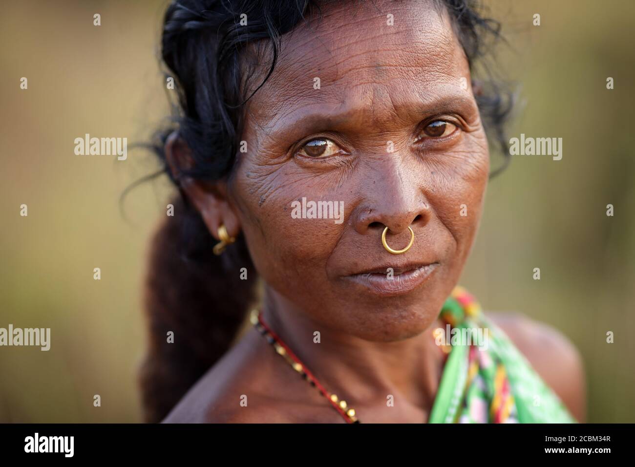 Desia Kondh tribal woman in a rural village near Gunupur in Odisha ...