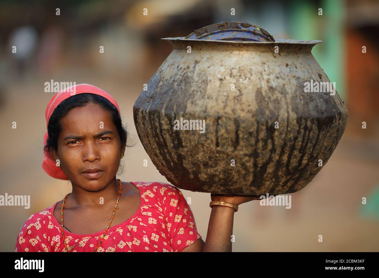 Desia Kondh tribal woman in a rural village near Gunupur in Odisha ...