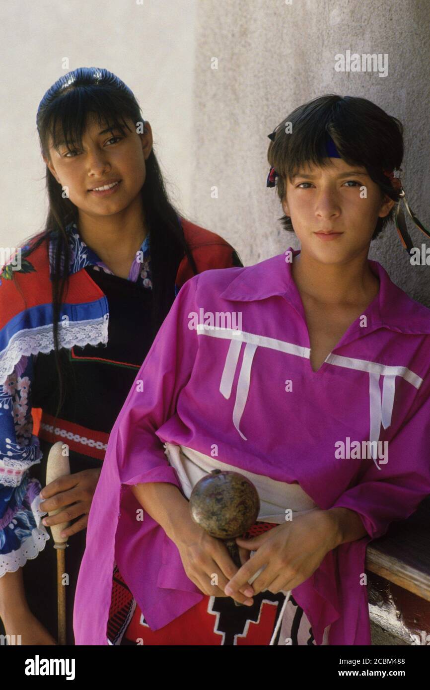 El Paso, Texas: Two young female members of the Tigua Indian tribe pose ...