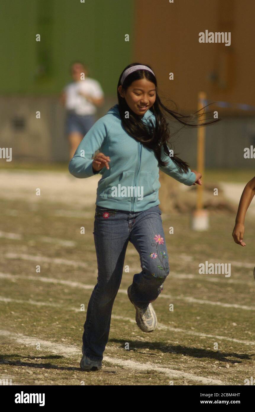 Austin, Texas USA, May 2006. Fourth grade girls running 50-yard sprints ...