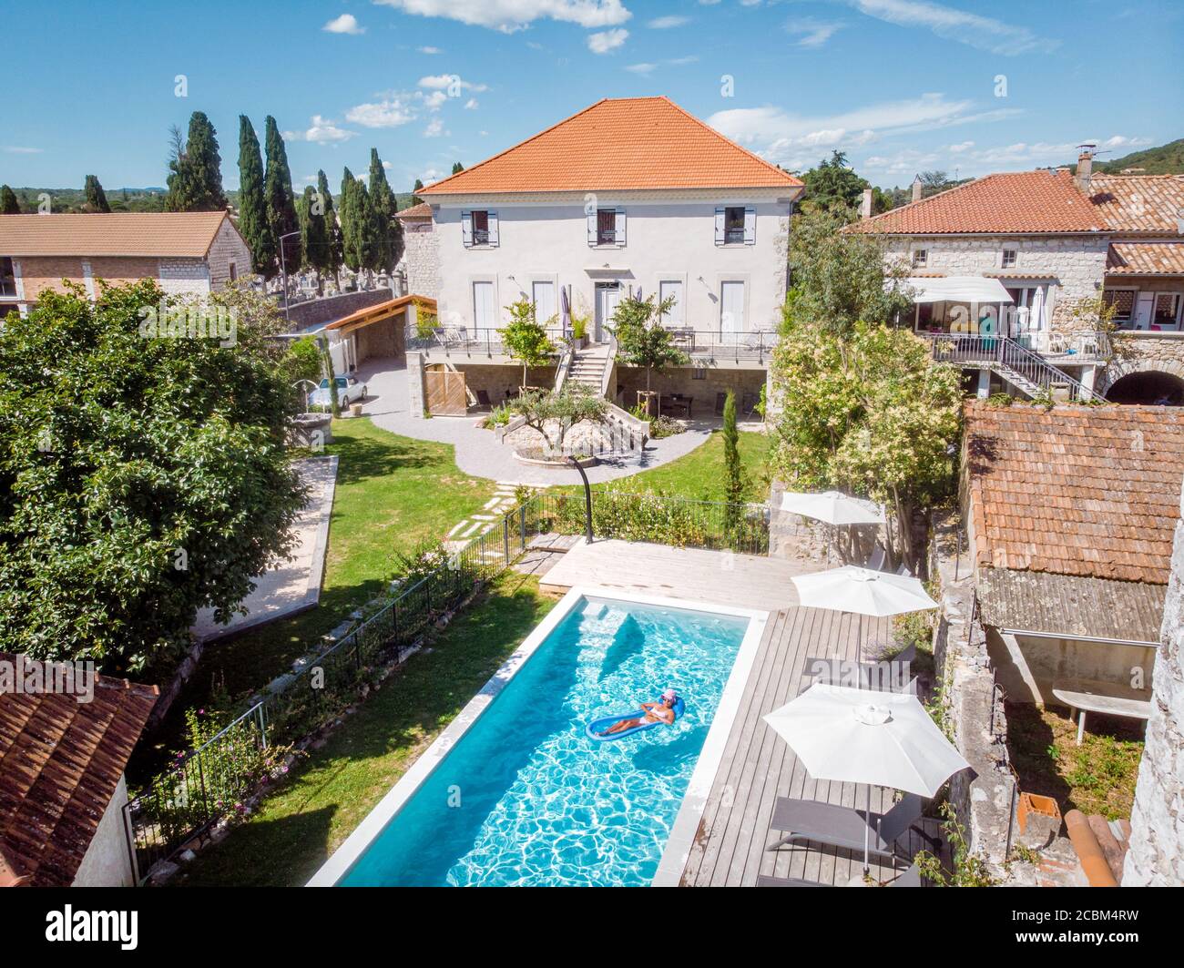 two person swim in the pool at the hotel. View from above, couple men ...