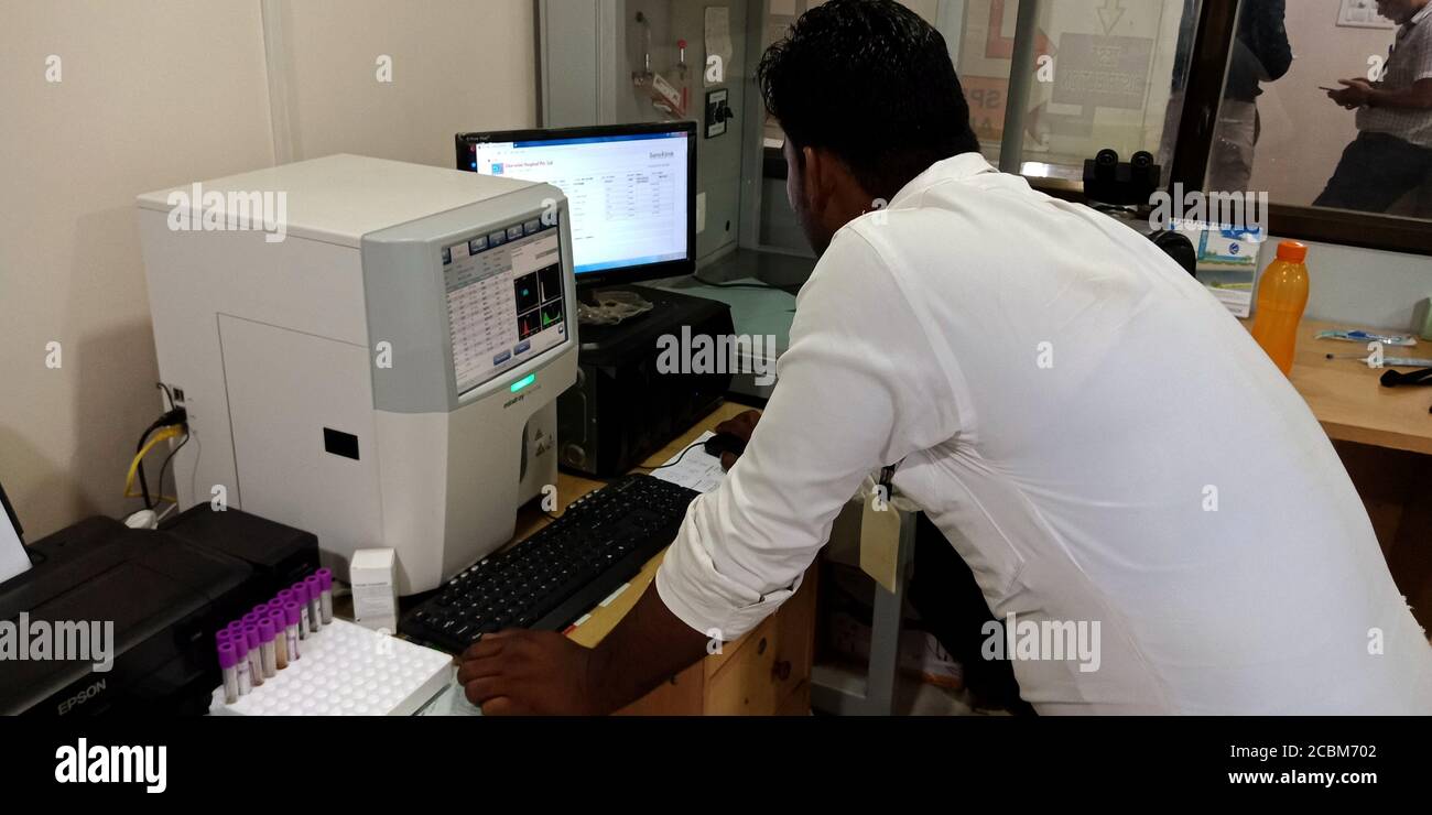 DISTRICT KATNI, INDIA - SEPTEMBER 18, 2019: An asian lab technician ...