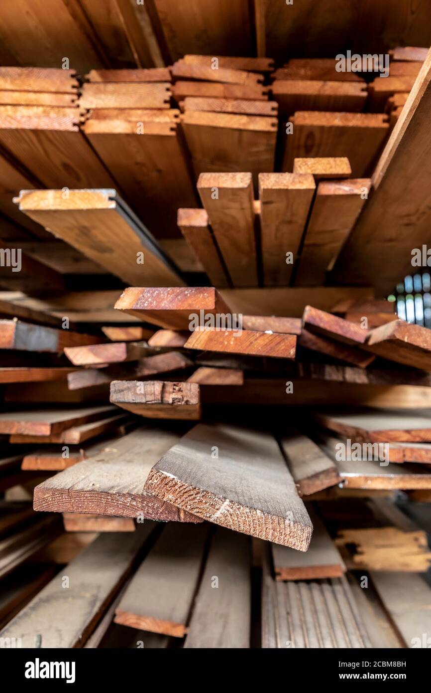 pile of timber in woodworking industry Stock Photo - Alamy