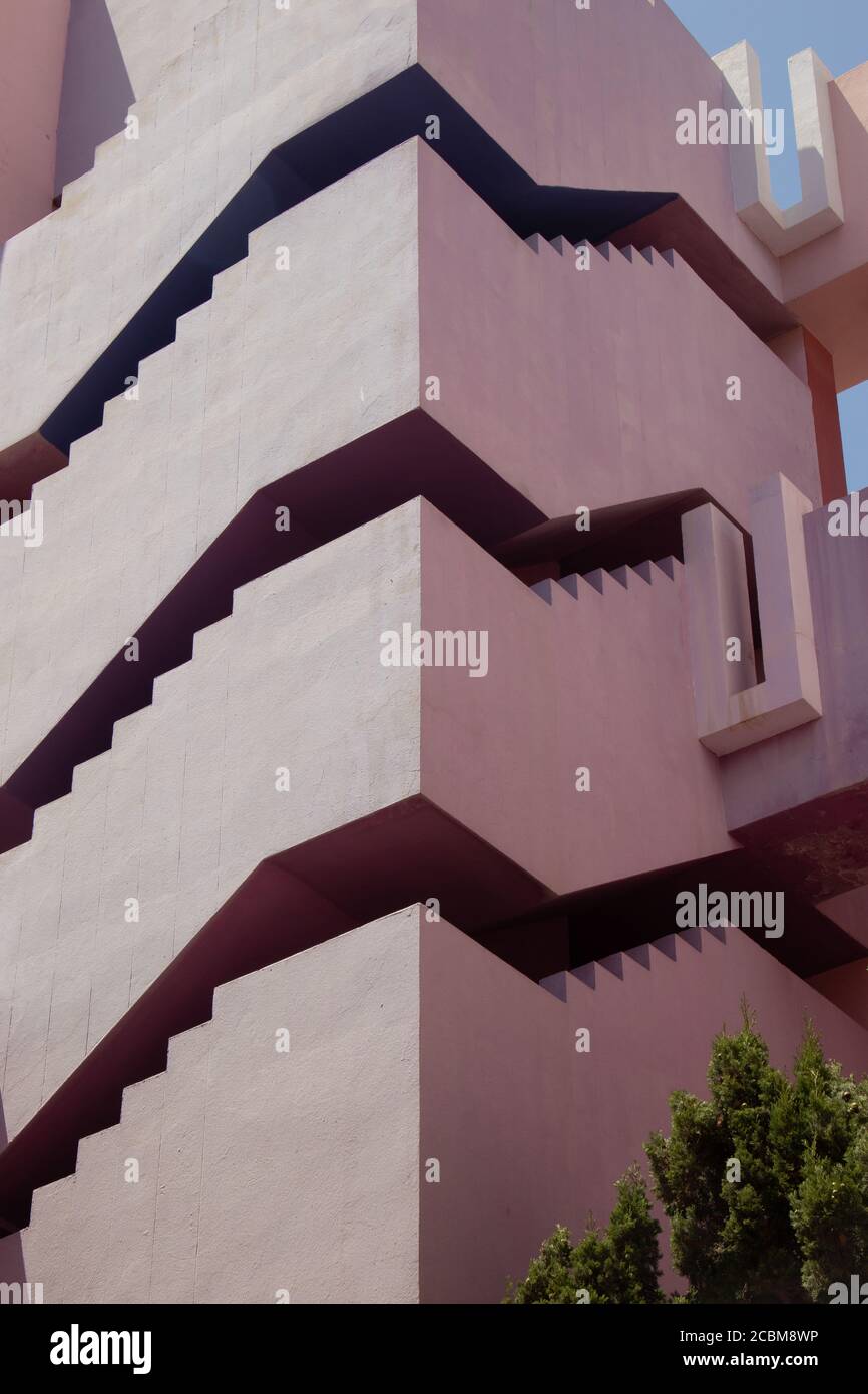 Purple stairs with blue background Stock Photo - Alamy