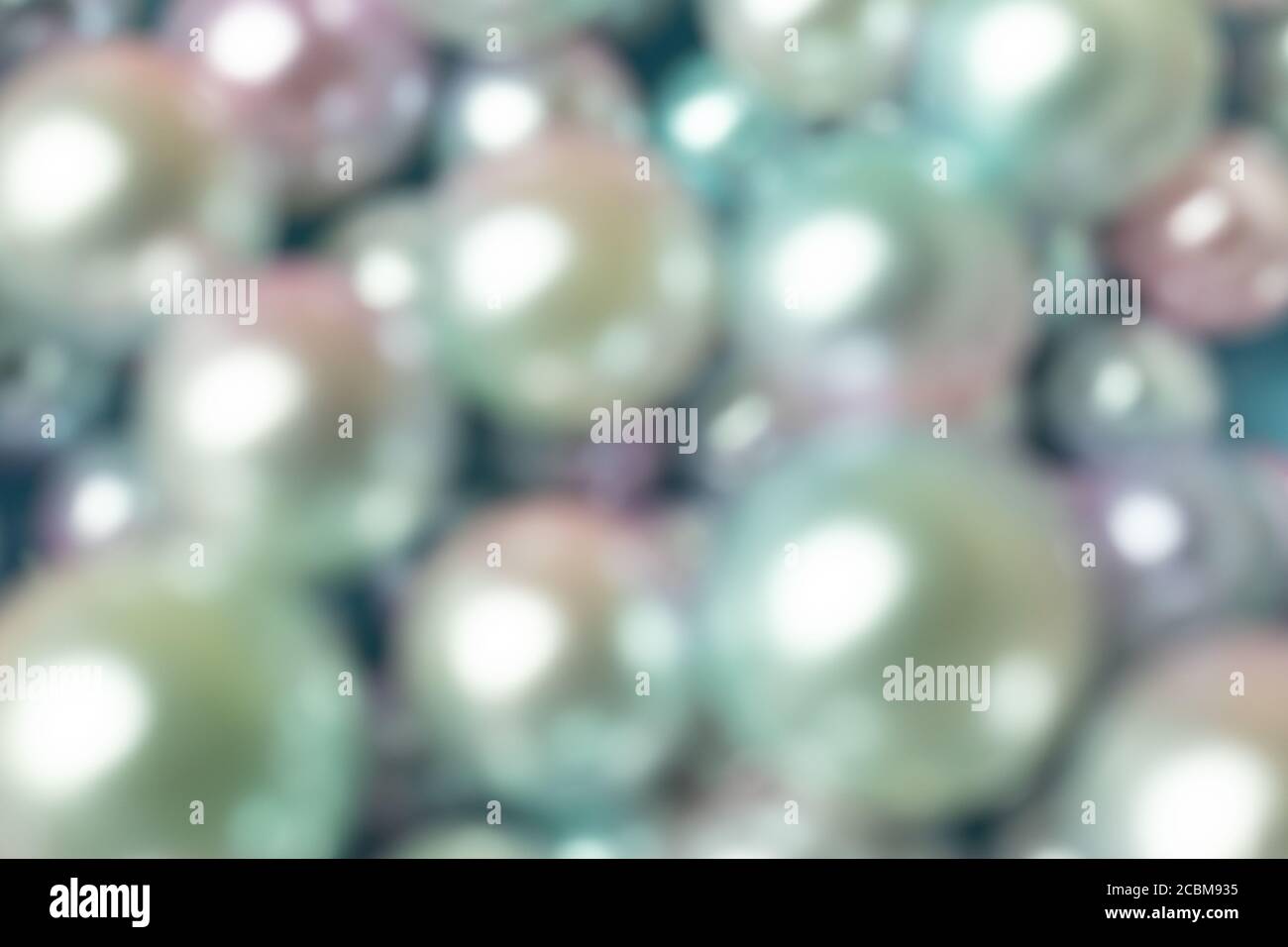 Pearls jewelry blurry background with copy space Stock Photo - Alamy